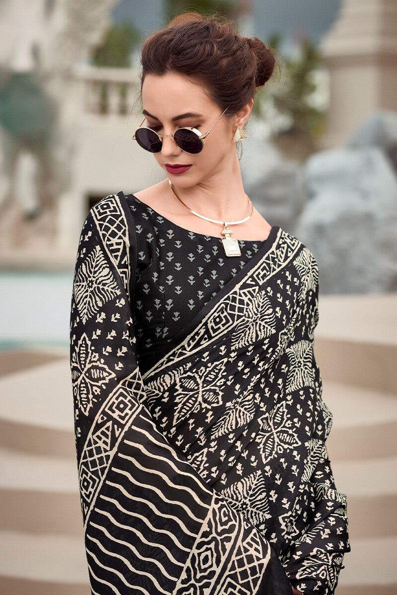 Cynosure Black Printed Mul Cotton Saree With Beleaguer Blouse Piece ...